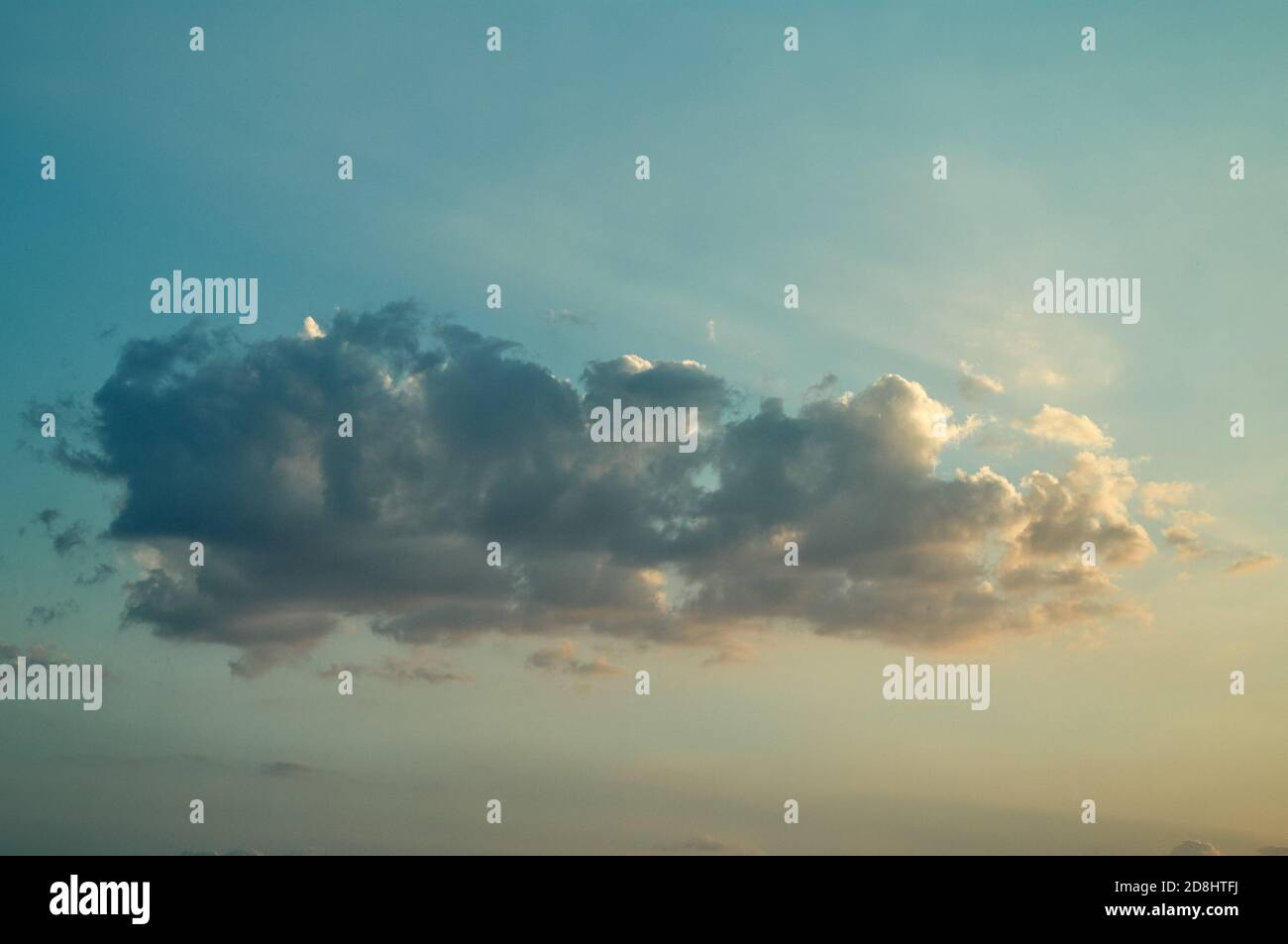 Single white cloud only one on blue sky background Stock Photo - Alamy