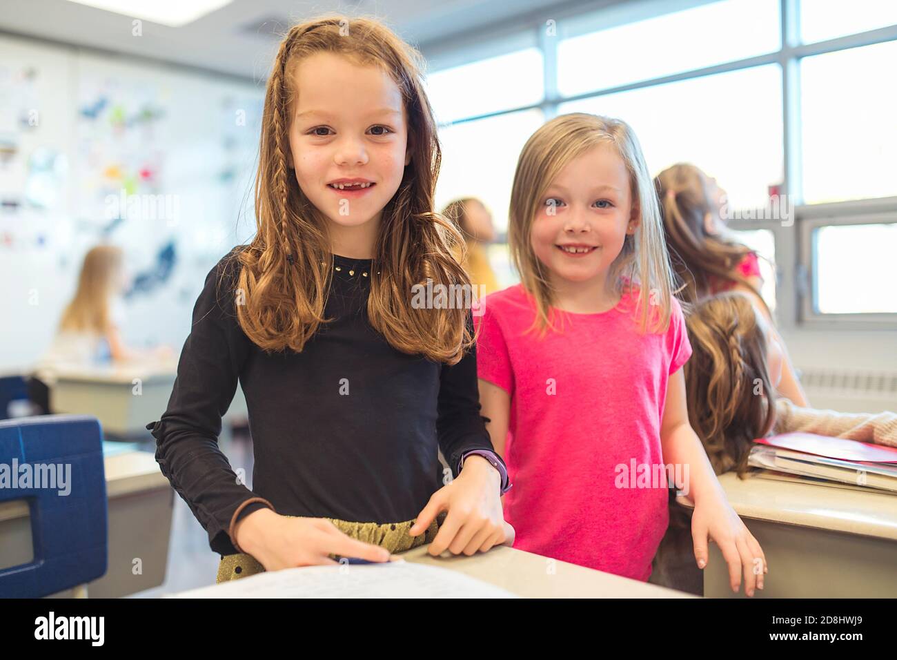 A education and school concept little student girl together studying at ...