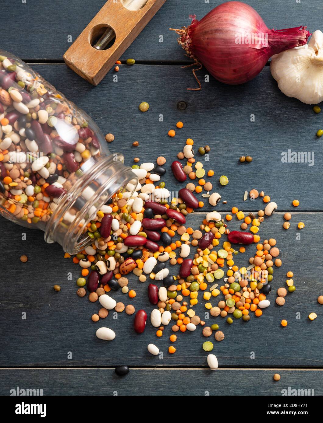 Legumes pulses mix on blue tabletop background. Dry mixture for ...