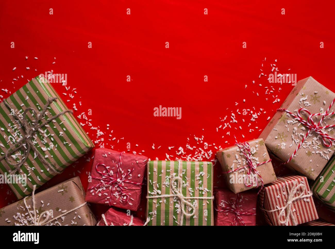 Christmas gifts Gifts on a red background. Simple, classic red and ...