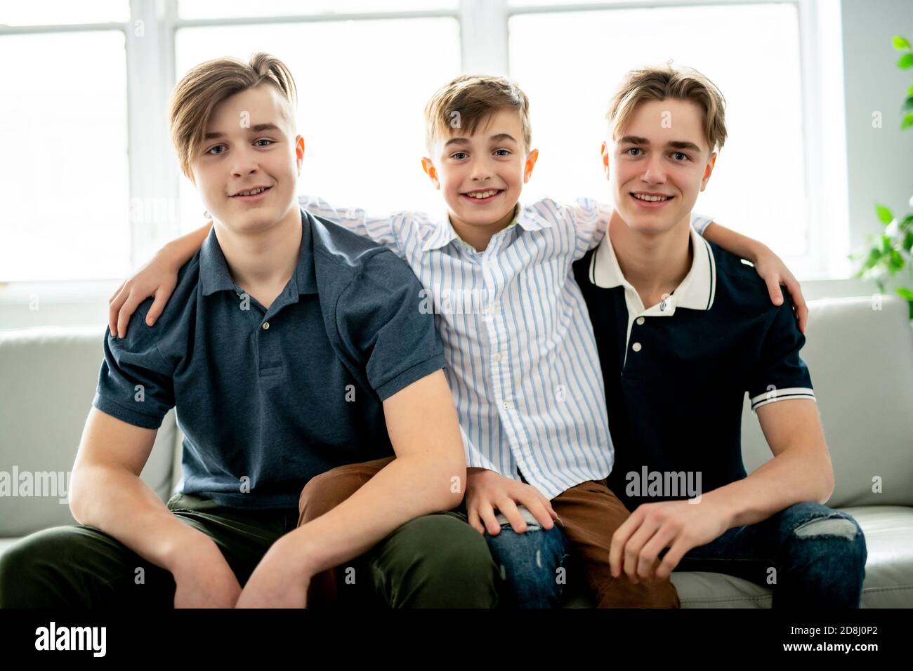 Two happy friends portrait inside house happy Stock Photo - Alamy