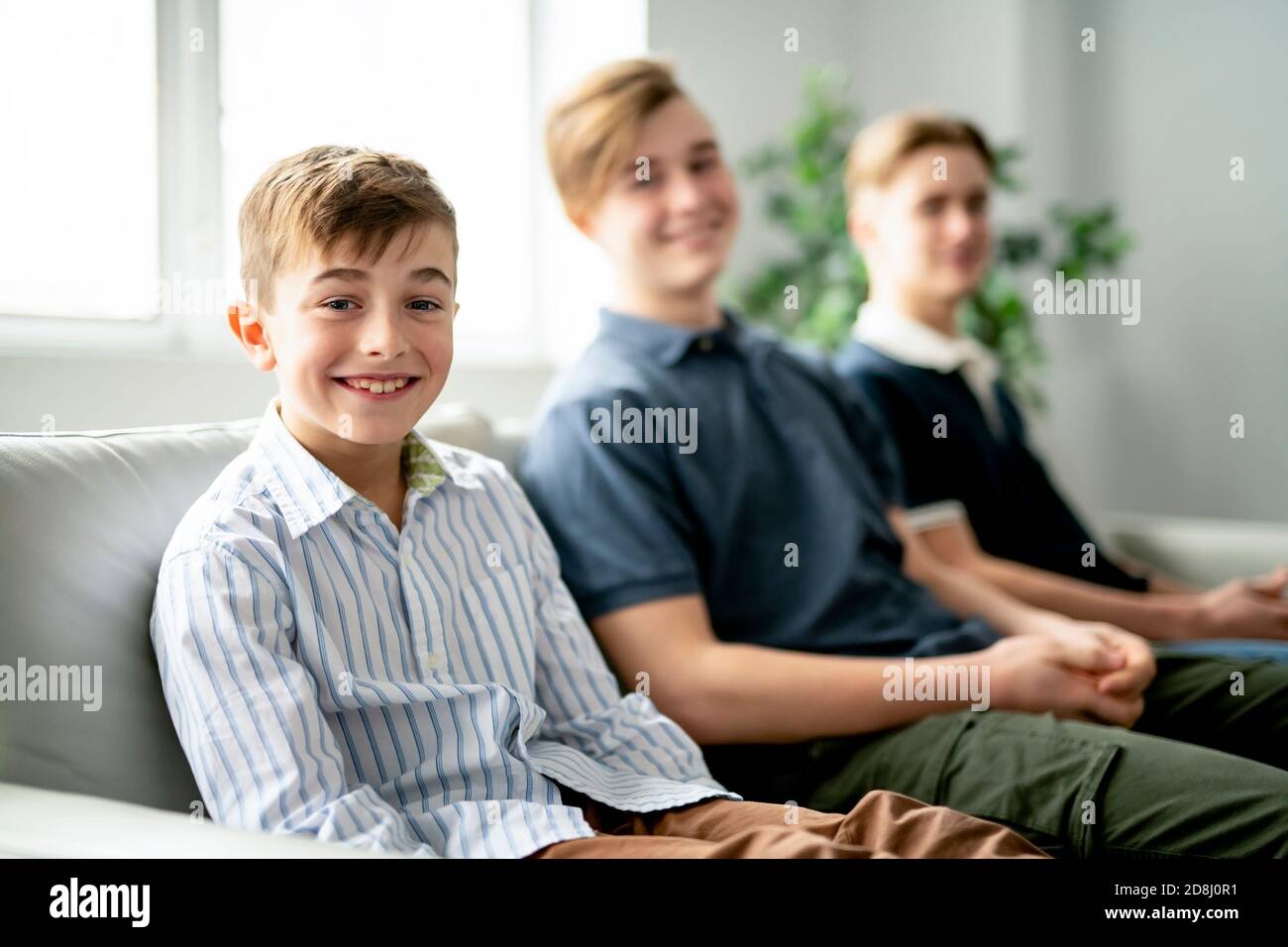 Two happy friends portrait inside house happy Stock Photo - Alamy