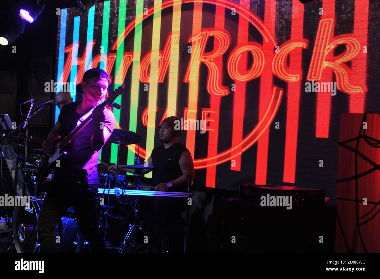 The Filipino band, Band@Work, plays a Halloween show at The Hard Rock ...