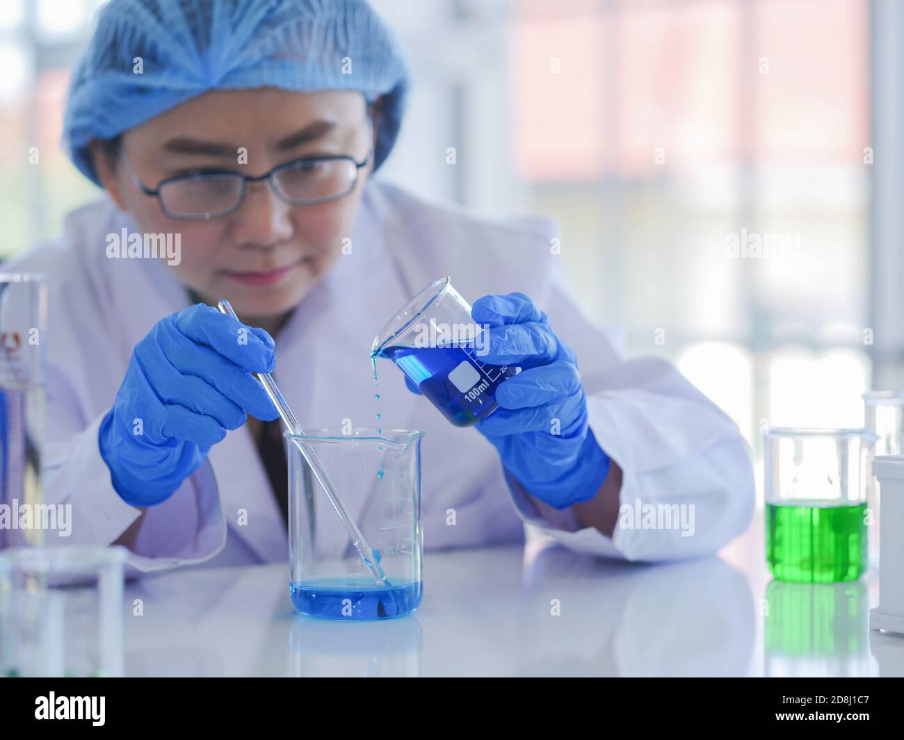 Female Chemist At Work