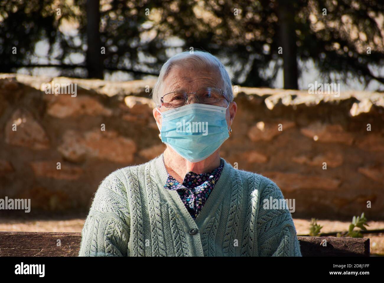 Older woman wearing a mask hi-res stock photography and images - Alamy