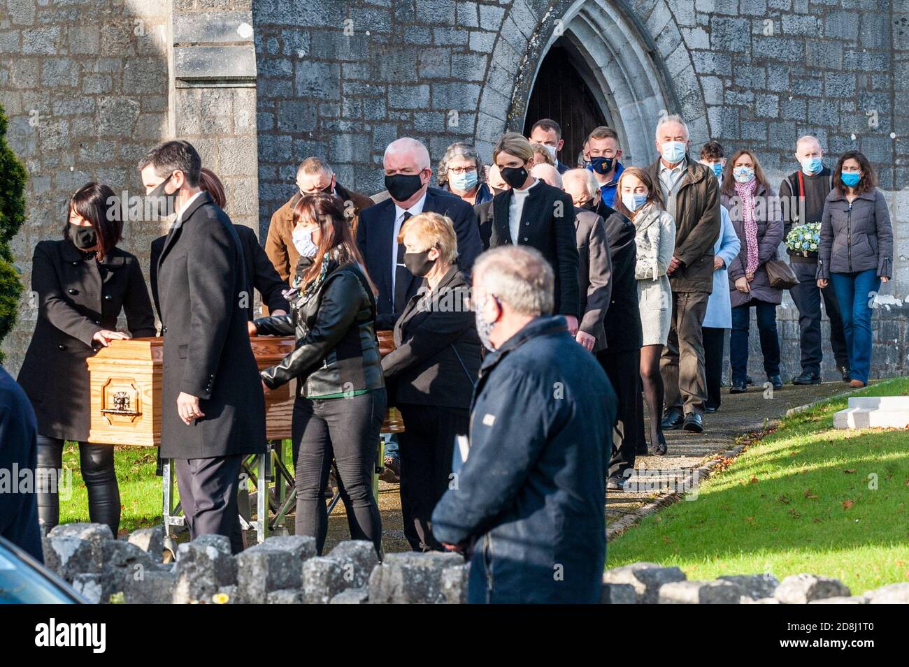The coffins of Tadhg O'Sullivan and his son Diarmuid, leave St Mary's ...