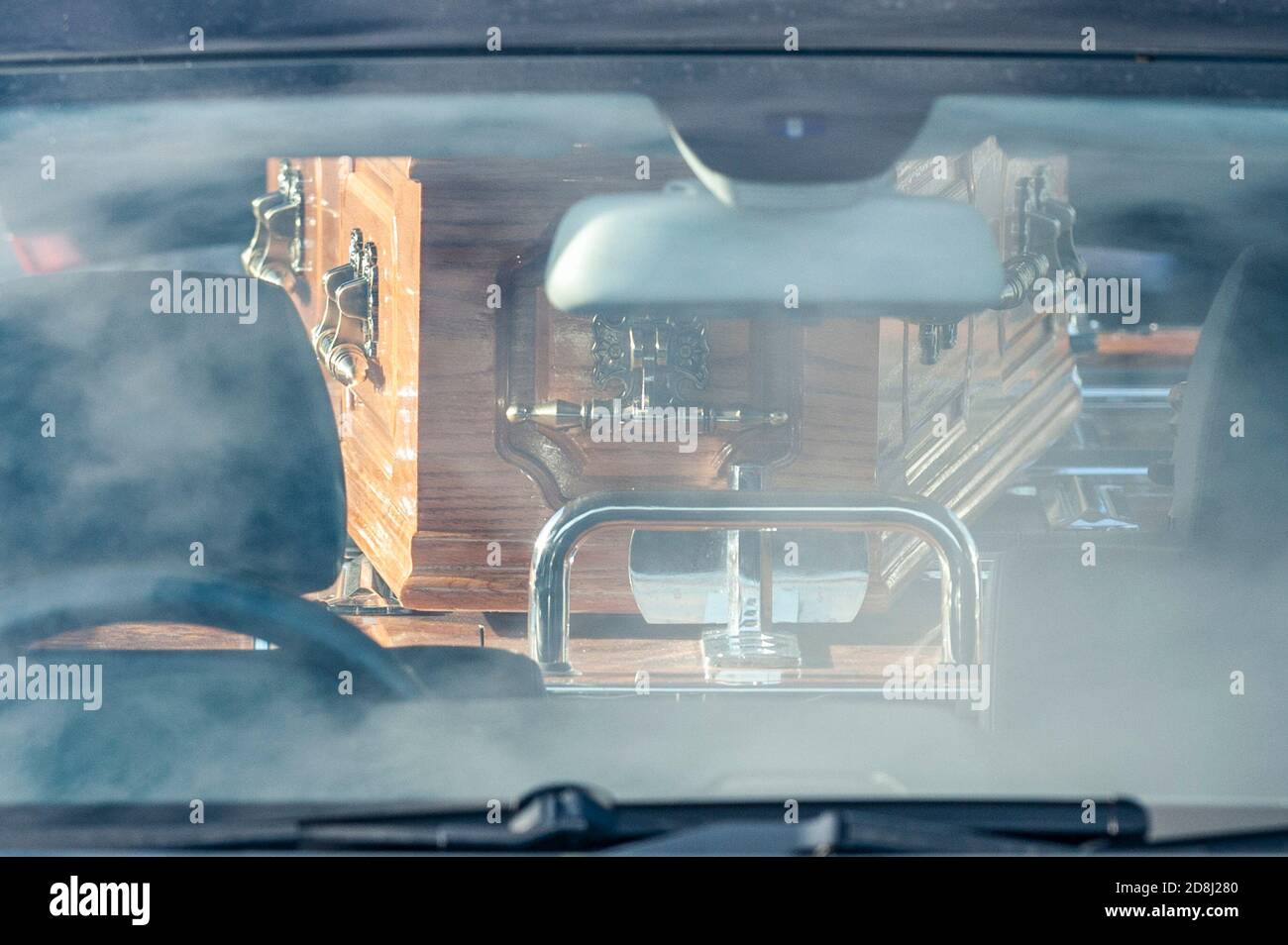 The coffins of Tadhg O'Sullivan and his son Diarmuid, leave St Mary's ...