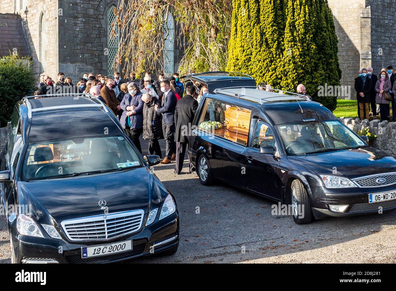 The coffins of Tadhg O'Sullivan and his son Diarmuid, leave St Mary's ...