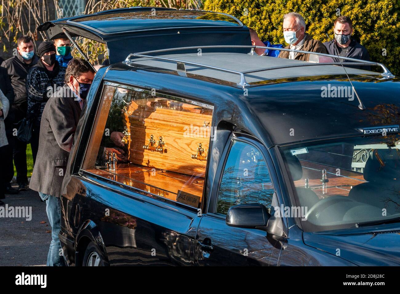 The coffins of Tadhg O'Sullivan and his son Diarmuid, leave St Mary's ...