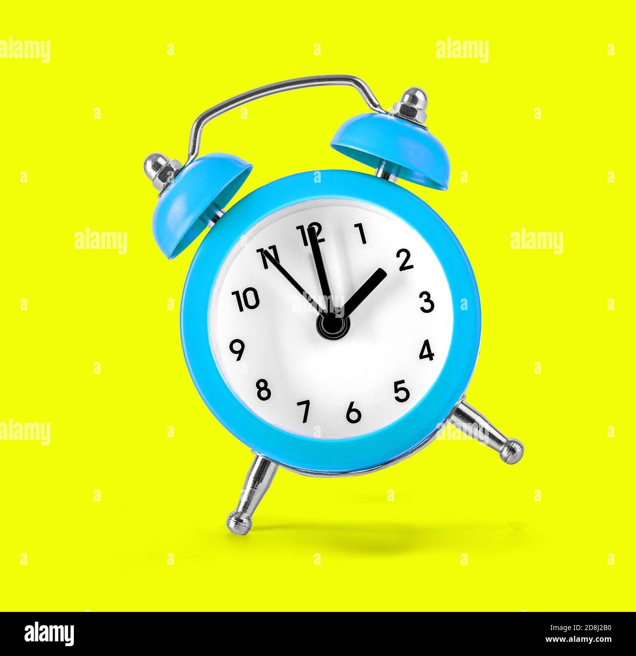 Yellow background alarm clock hi-res stock photography and images - Alamy
