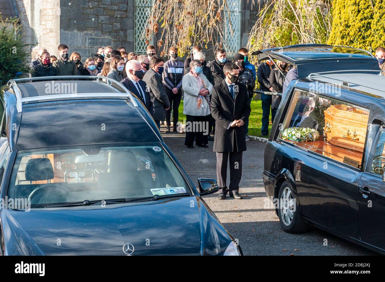 The coffins of Tadhg O'Sullivan and his son Diarmuid, leave St Mary's ...