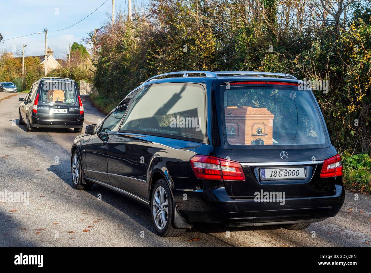 The coffins of Tadhg O'Sullivan and his son Diarmuid, leave St Mary's ...
