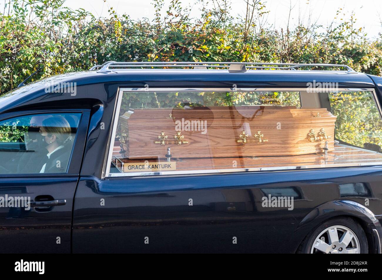 The coffins of Tadhg O'Sullivan and his son Diarmuid, leave St Mary's ...