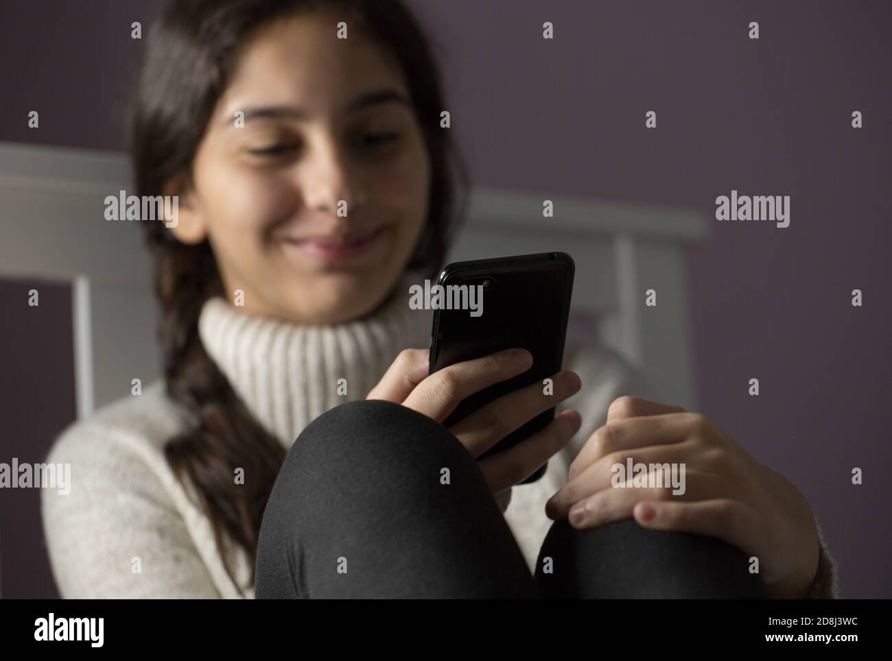 Brunette girl using smartphone hi-res stock photography and images - Alamy