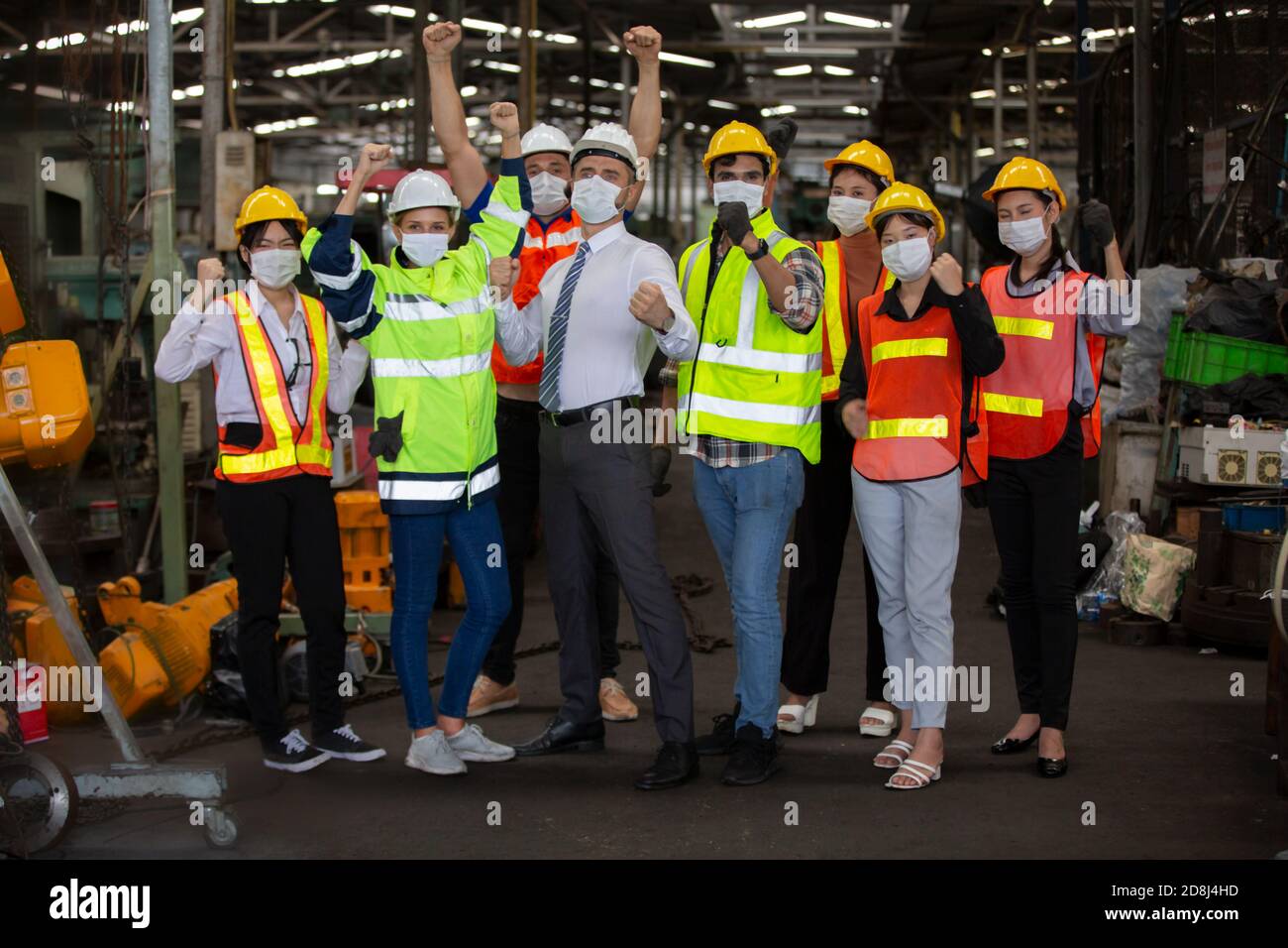 Male Industrial Engineers Talk with Factory Worker . They Work at the ...