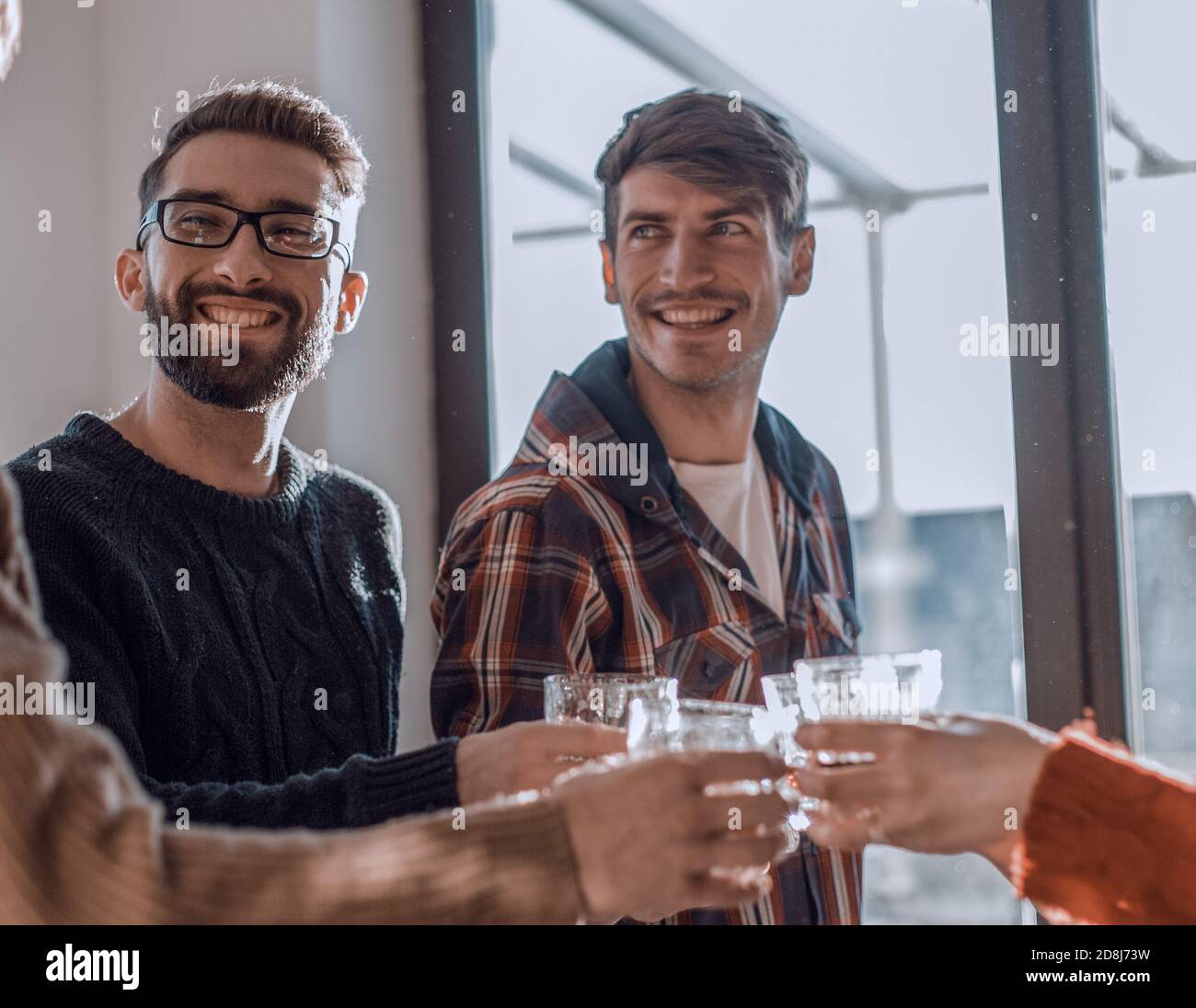image of a group of young people standing in a queue Stock Photo - Alamy