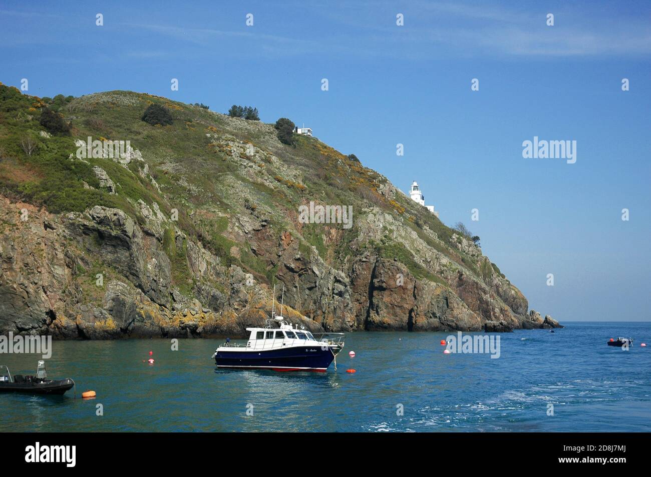 Launch at anchor past Point Robert Lighthouse, near La Maseline Jetty ...