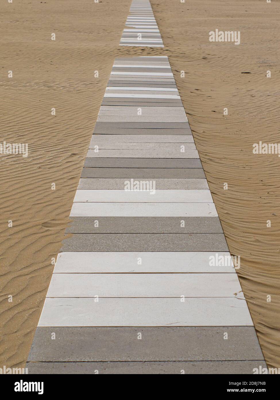 Path through the sand of a beach Stock Photo - Alamy