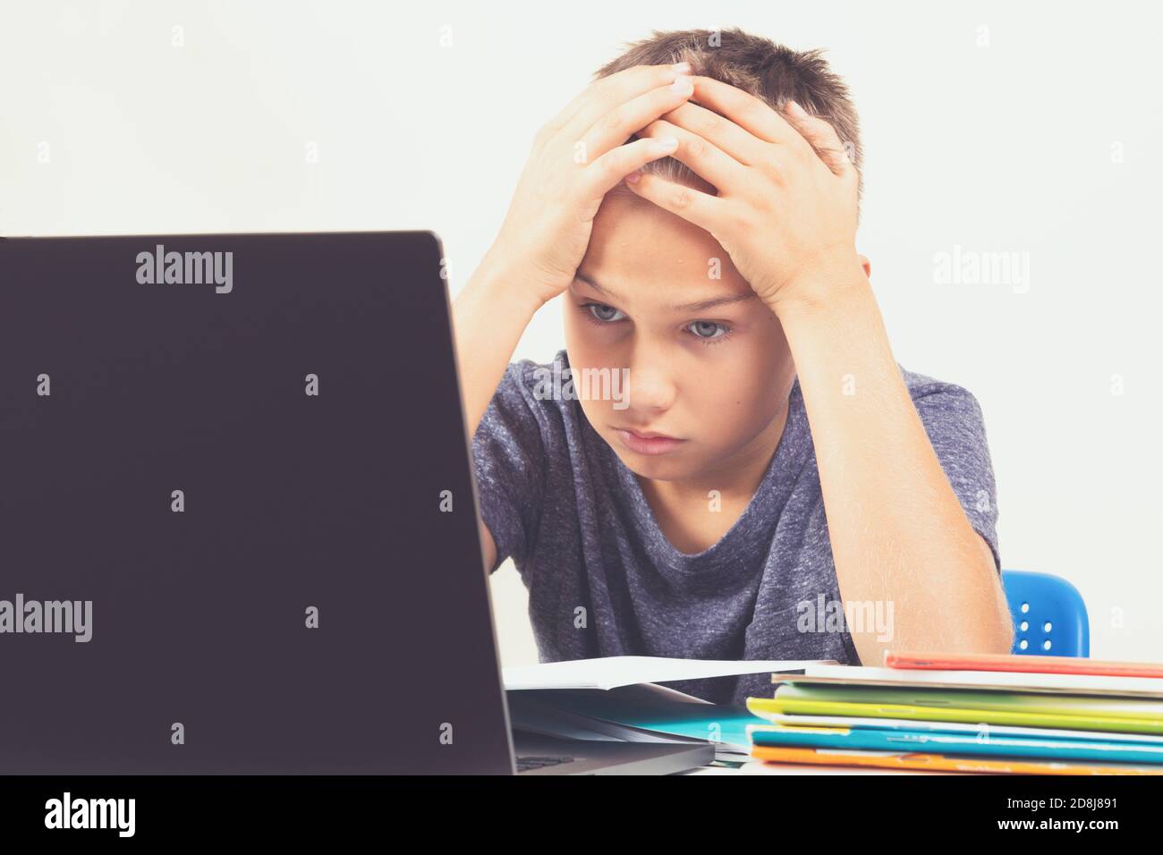 Kid with laptop computer doing homework at home. Technology, online ...