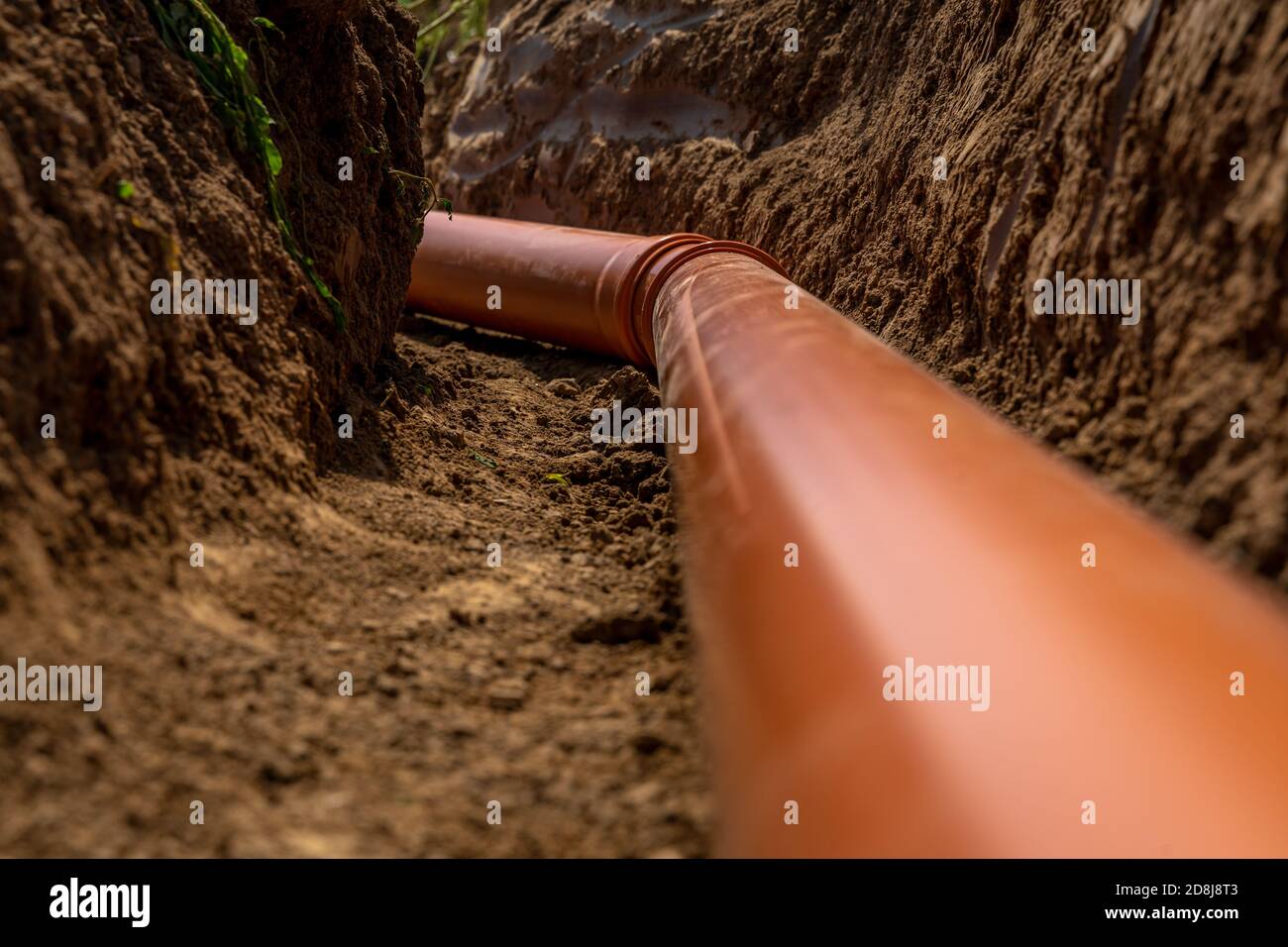 Plastic pipes in the ground during the construction of a building Stock ...