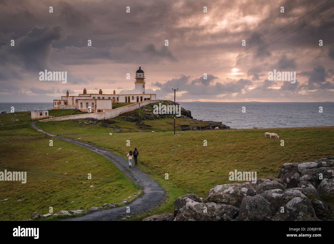 Neist Point Lighthouse at sunset, Isle of Skye, Scotland Stock Photo ...