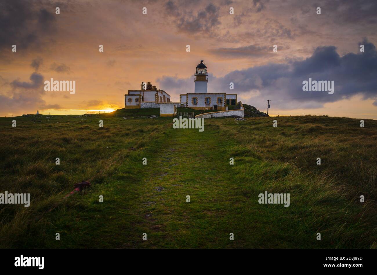 Neist Point Lighthouse at sunset, Isle of Skye, Scotland Stock Photo ...