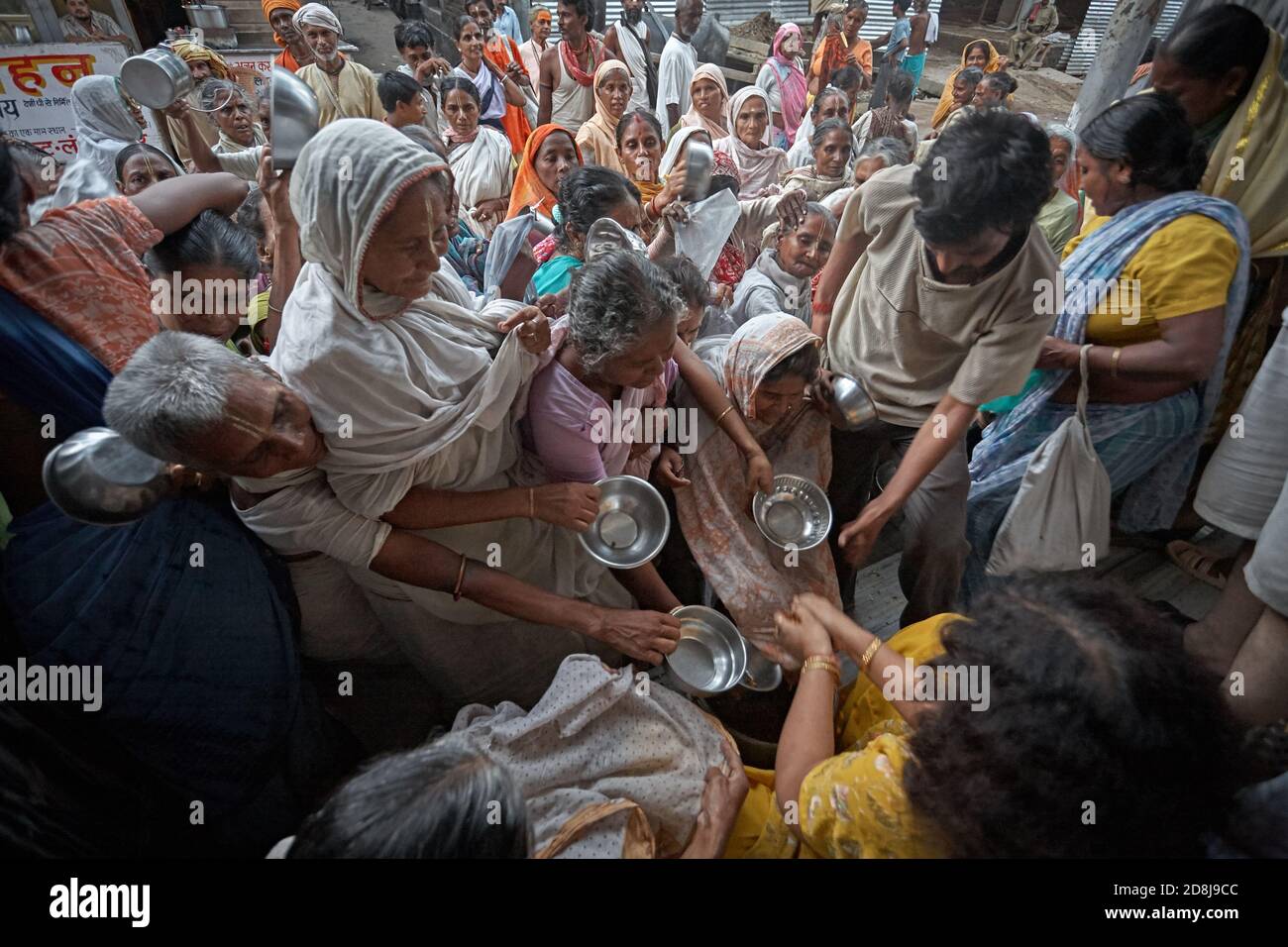 Vrindavan, India, August 2009. Widows fighting over food Stock Photo ...