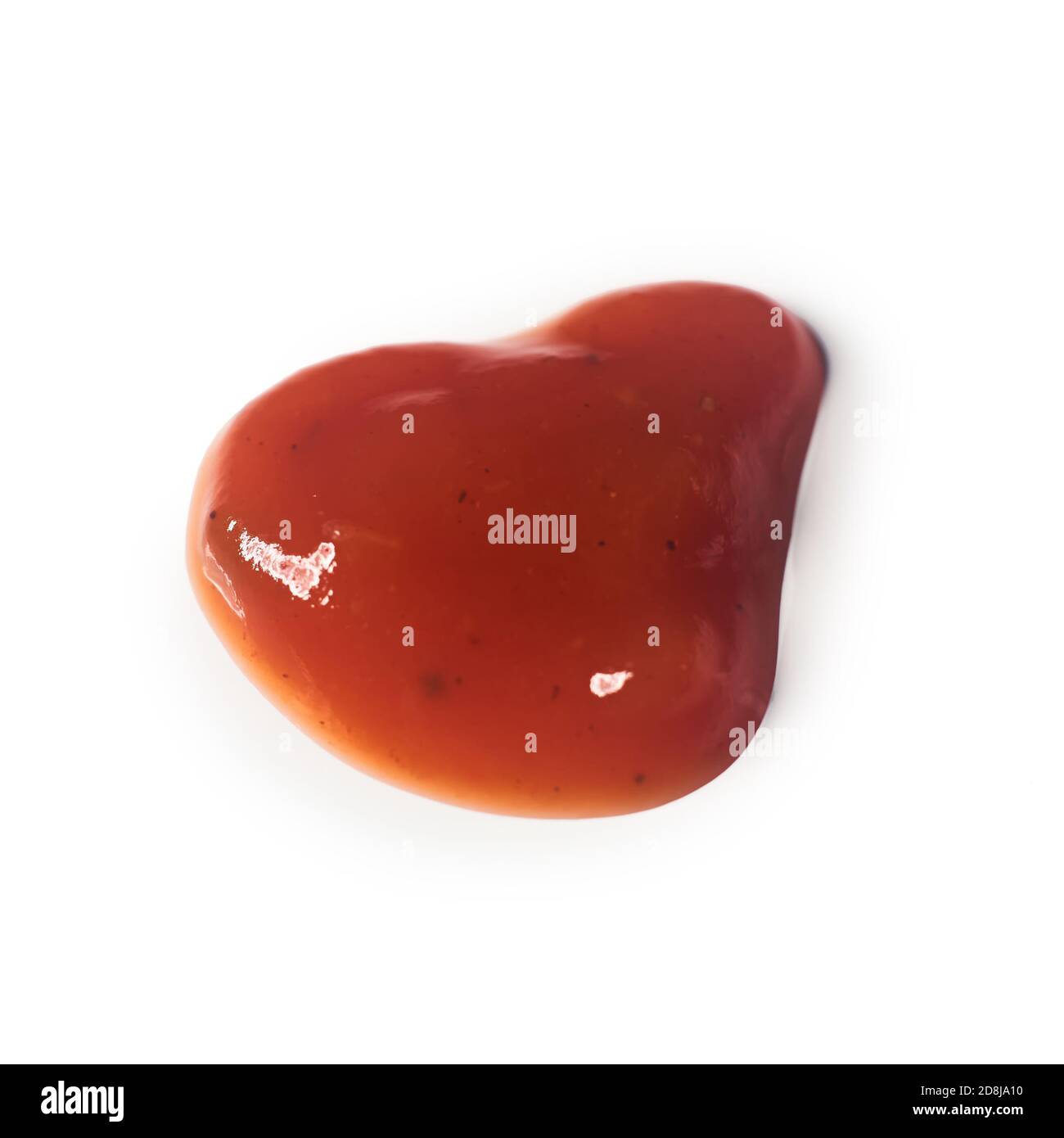 Drop of red sauce or ketchup isolated on white background close-up ...