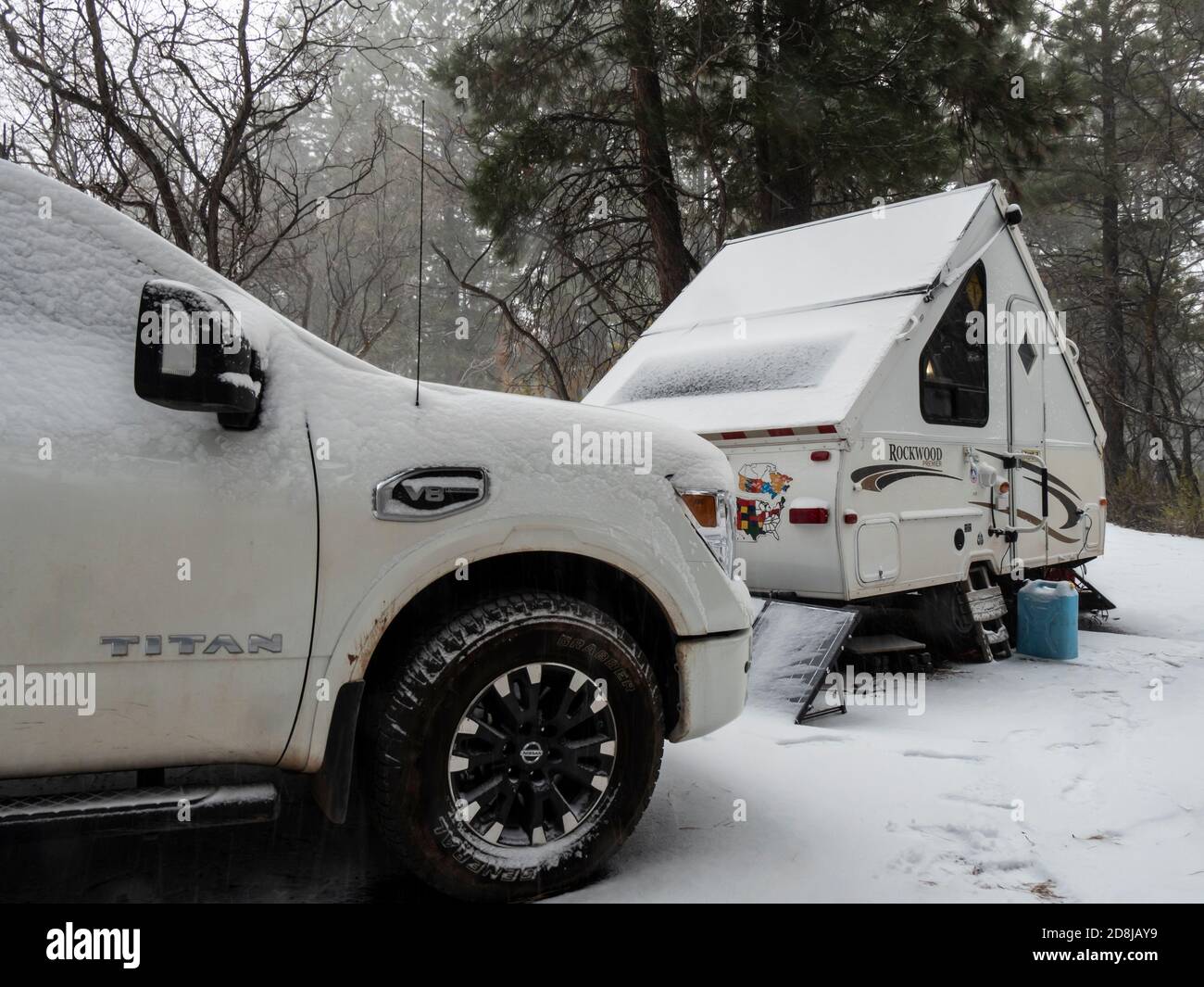 Snow falls on camping trailer in the Grand Canyon North Rim campground ...