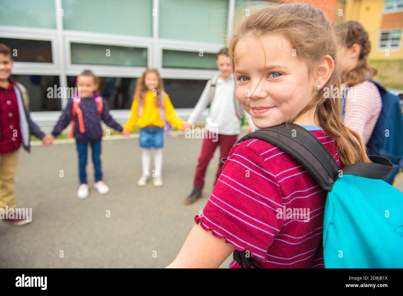 group of kids on the school background having fun Stock Photo - Alamy