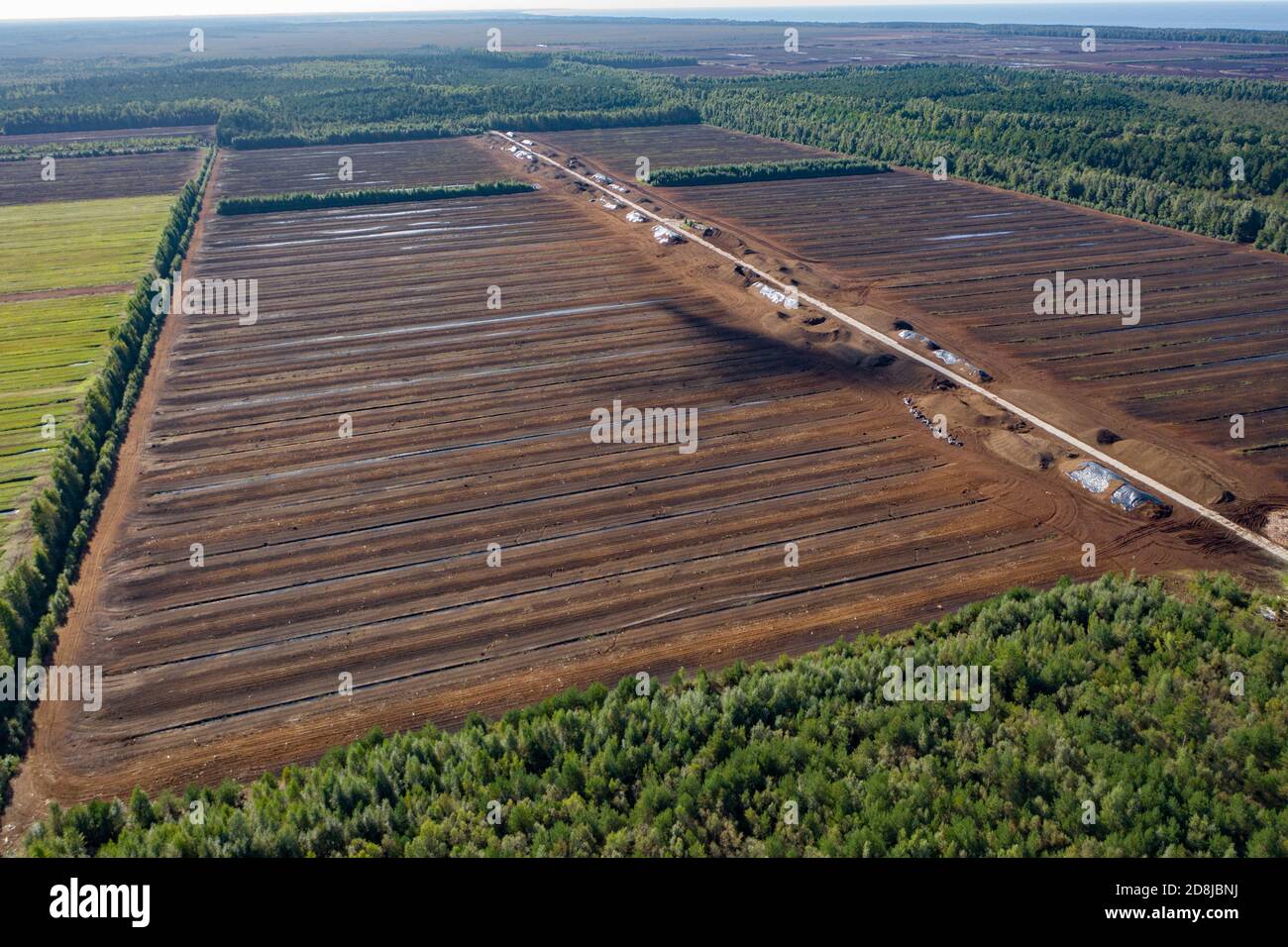 Aerial view of peat harvesting field. Peat extraction Stock Photo - Alamy