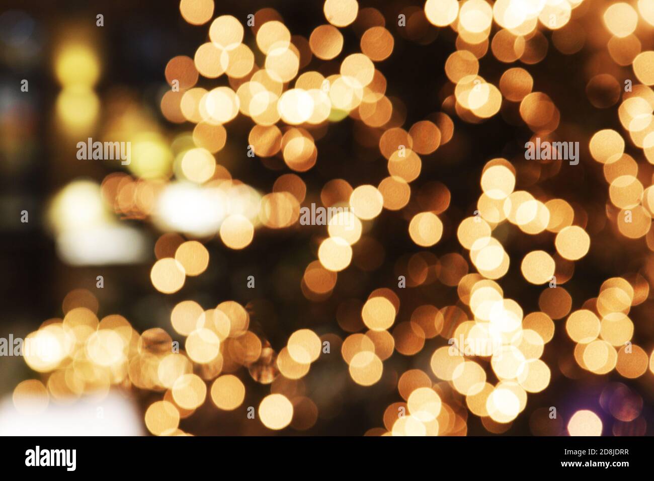 Christmas tree with lights glowing and snow Stock Photo - Alamy