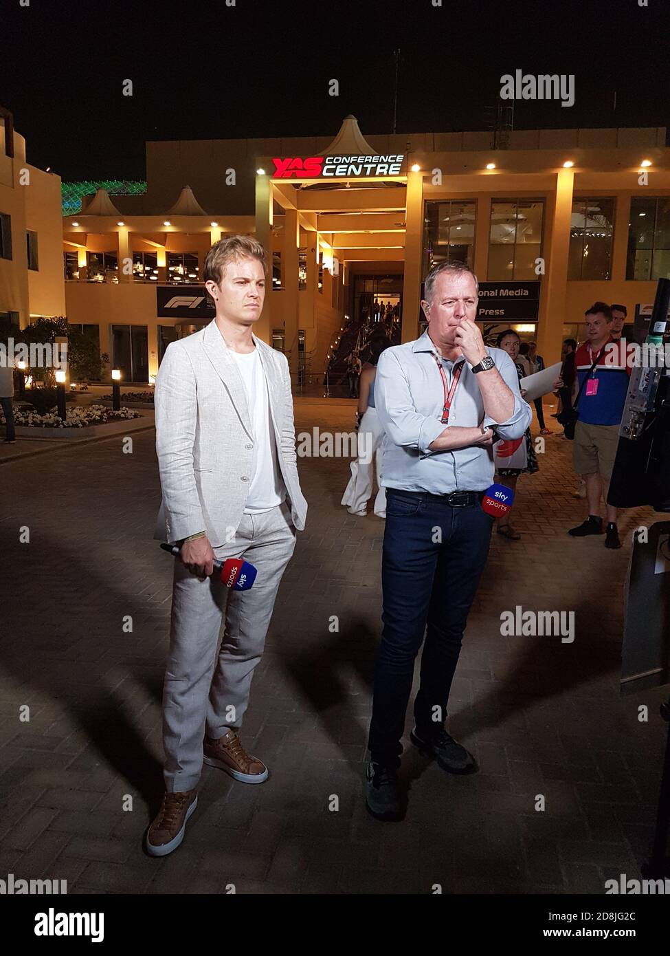Niko Rosberg and friend ready for the interview, standing in front of ...