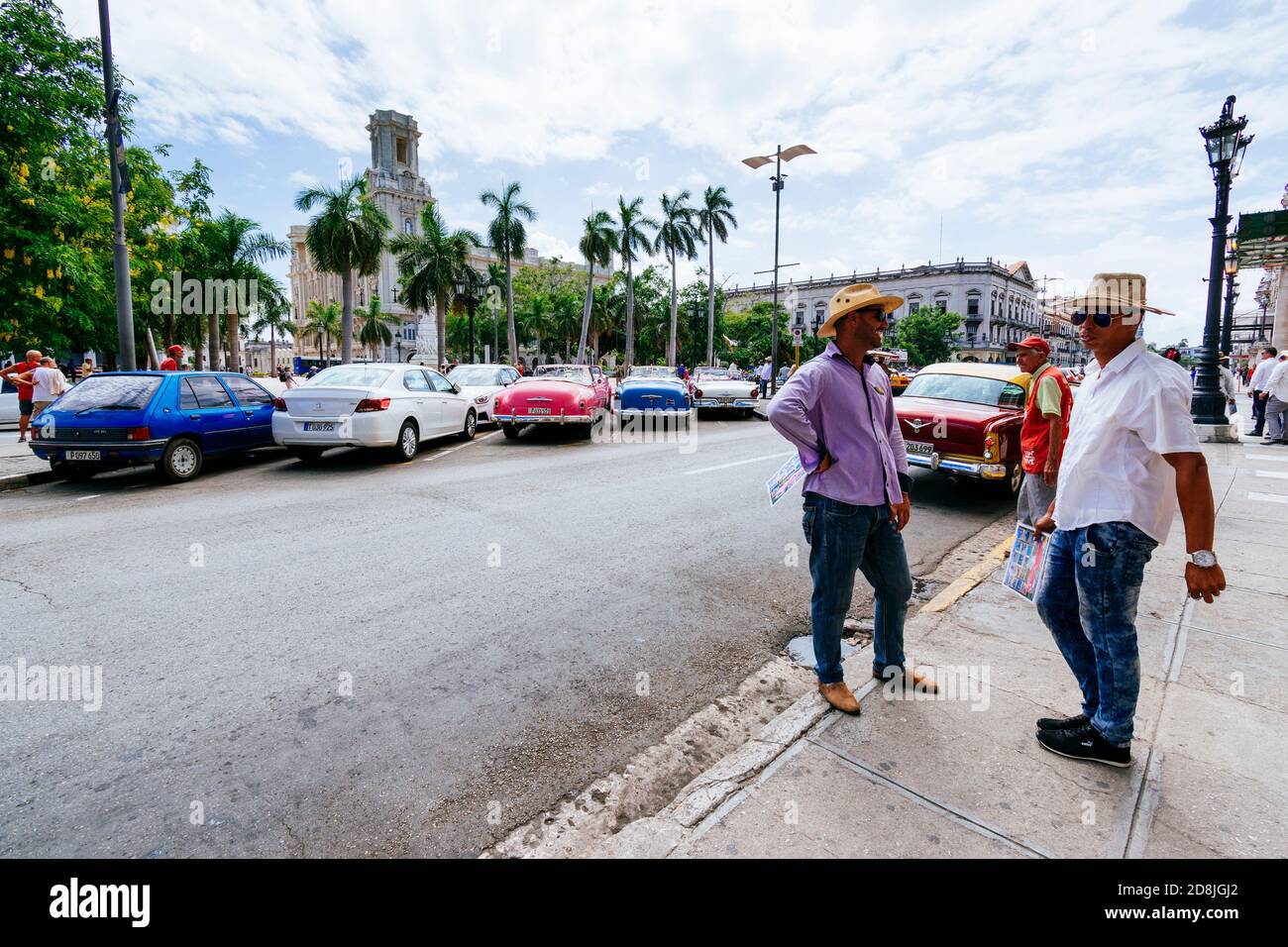 Cuban workers offer tourist services, Central Park - Parque Central ...