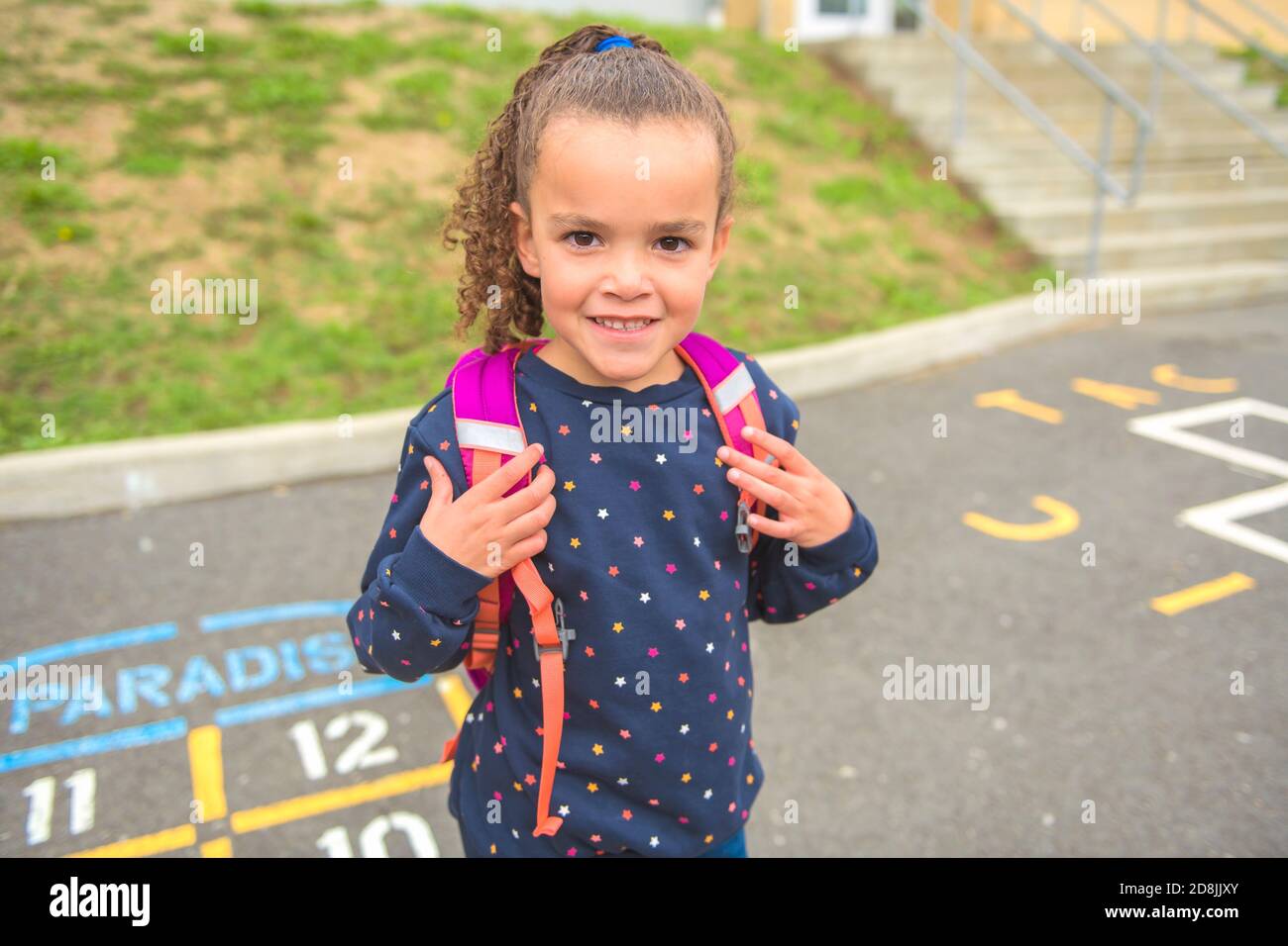 A nice Portrait of cute hispanic girl with backpack at school Stock ...
