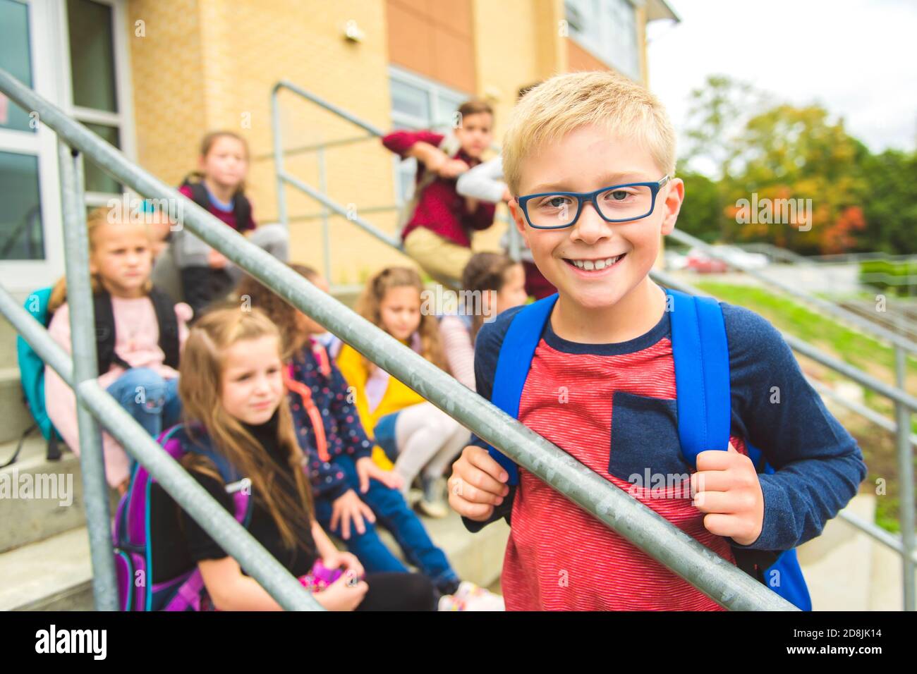 group of kids on the school background having fun Stock Photo - Alamy