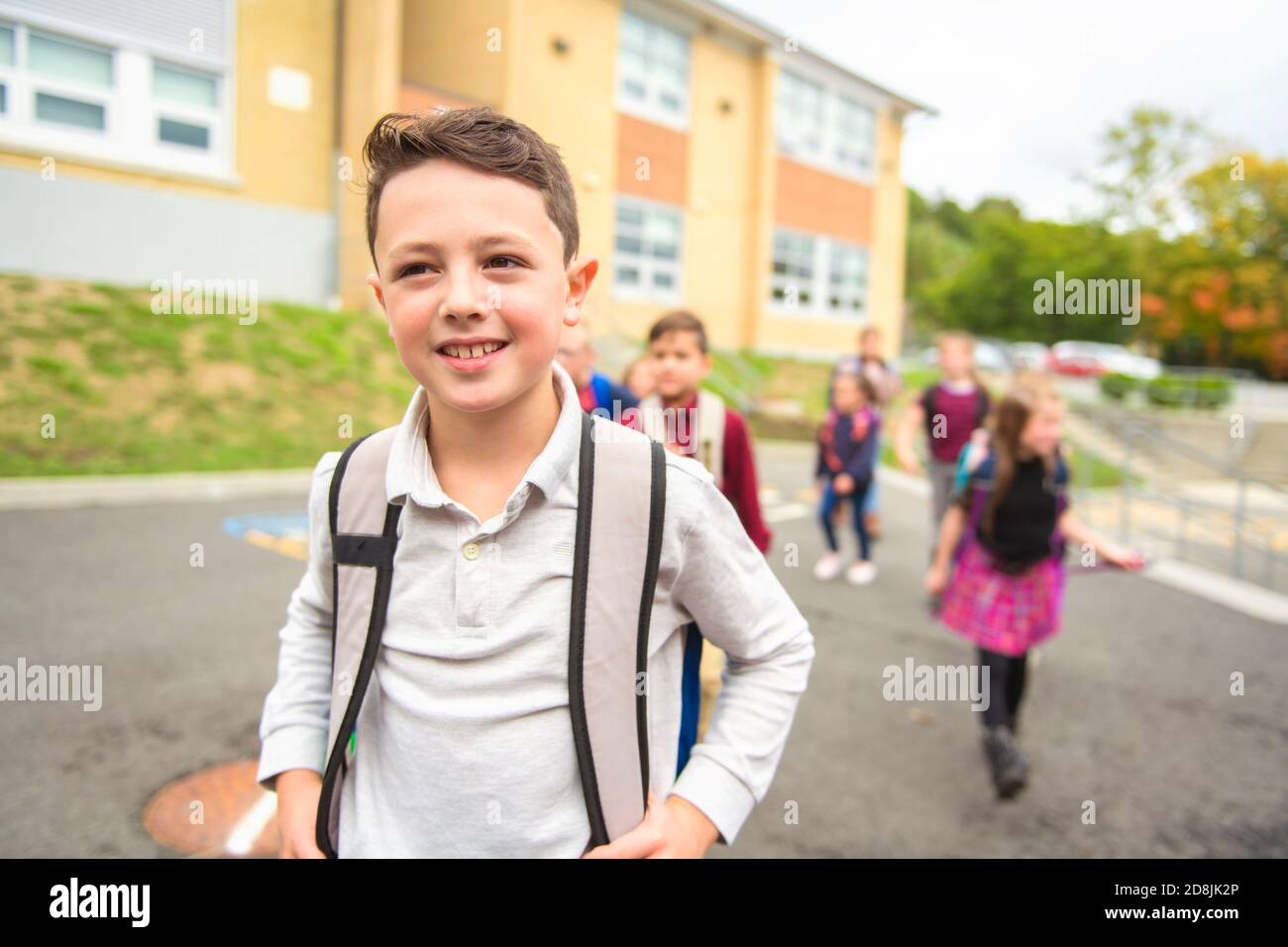 group of kids on the school background having fun Stock Photo - Alamy
