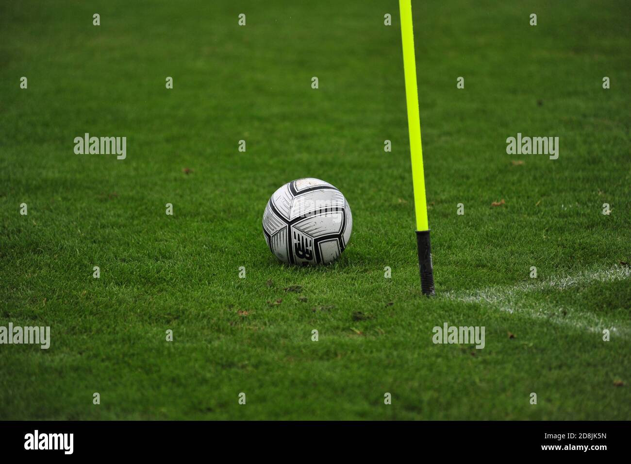 football corner marking with football on grass Stock Photo - Alamy