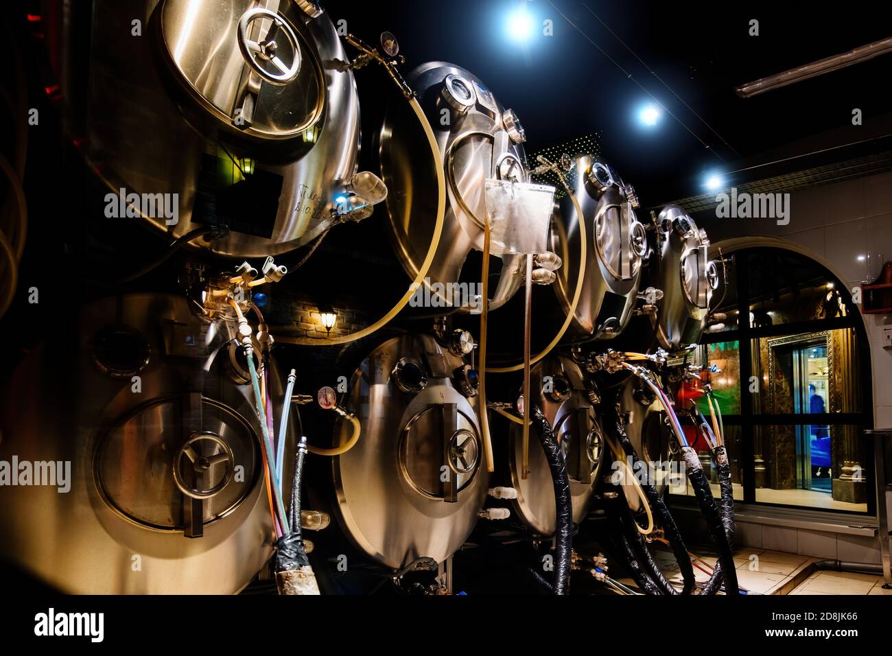 Beer kegs connected with pipes for beer serving at the bar in pub Stock ...