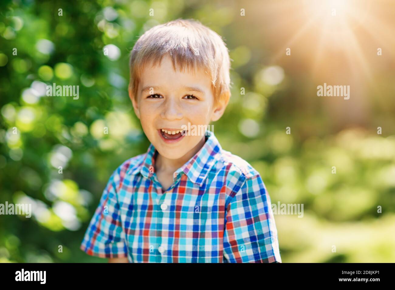 Happy child laughing alone hi-res stock photography and images - Alamy