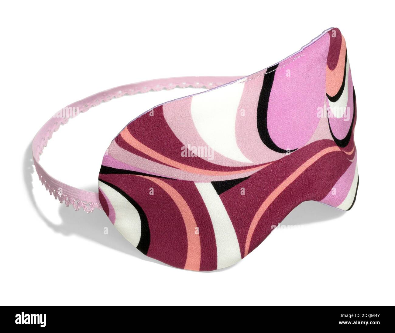 Multi-shade pink patterned sleep mask photographed on a white ...