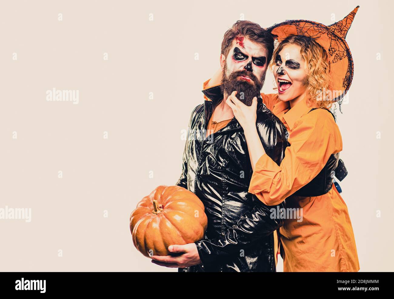 Happy gothic couple in Halloween costume. Halloween poster or greeting ...