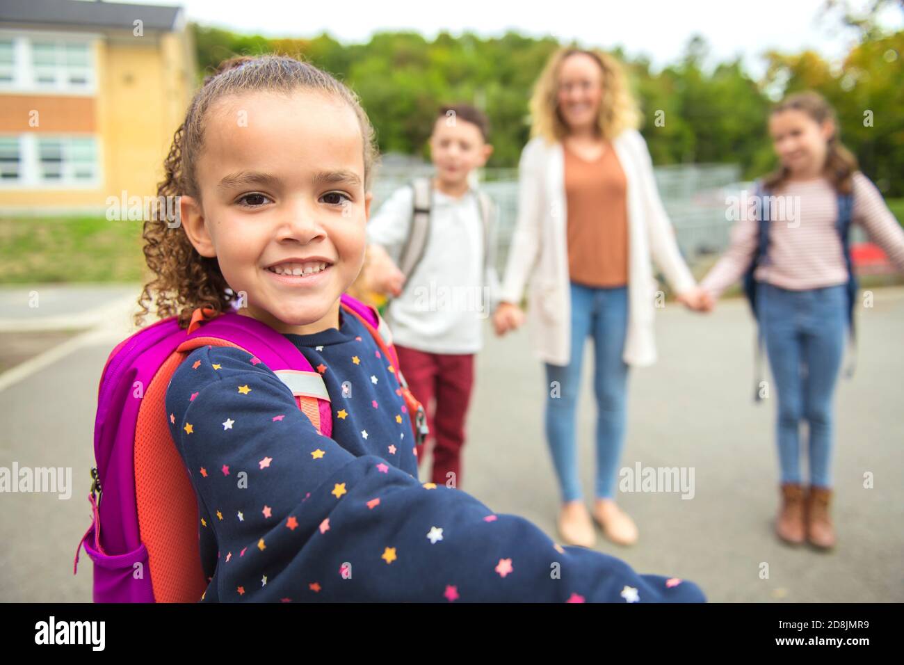group of kids on the school background having fun Stock Photo - Alamy
