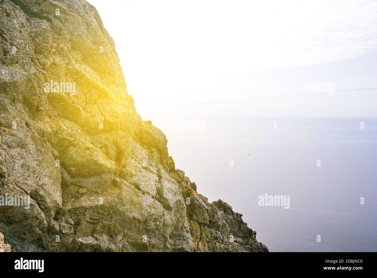 Rocky mountain and seascape. View from the mountain and sunlight ...
