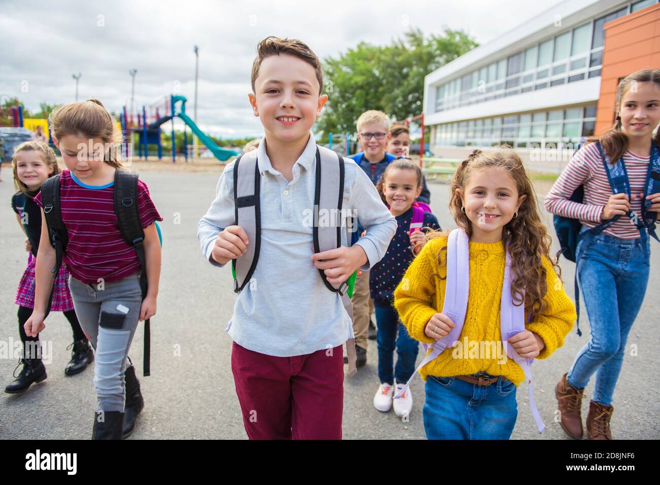 group of kids on the school background having fun Stock Photo - Alamy