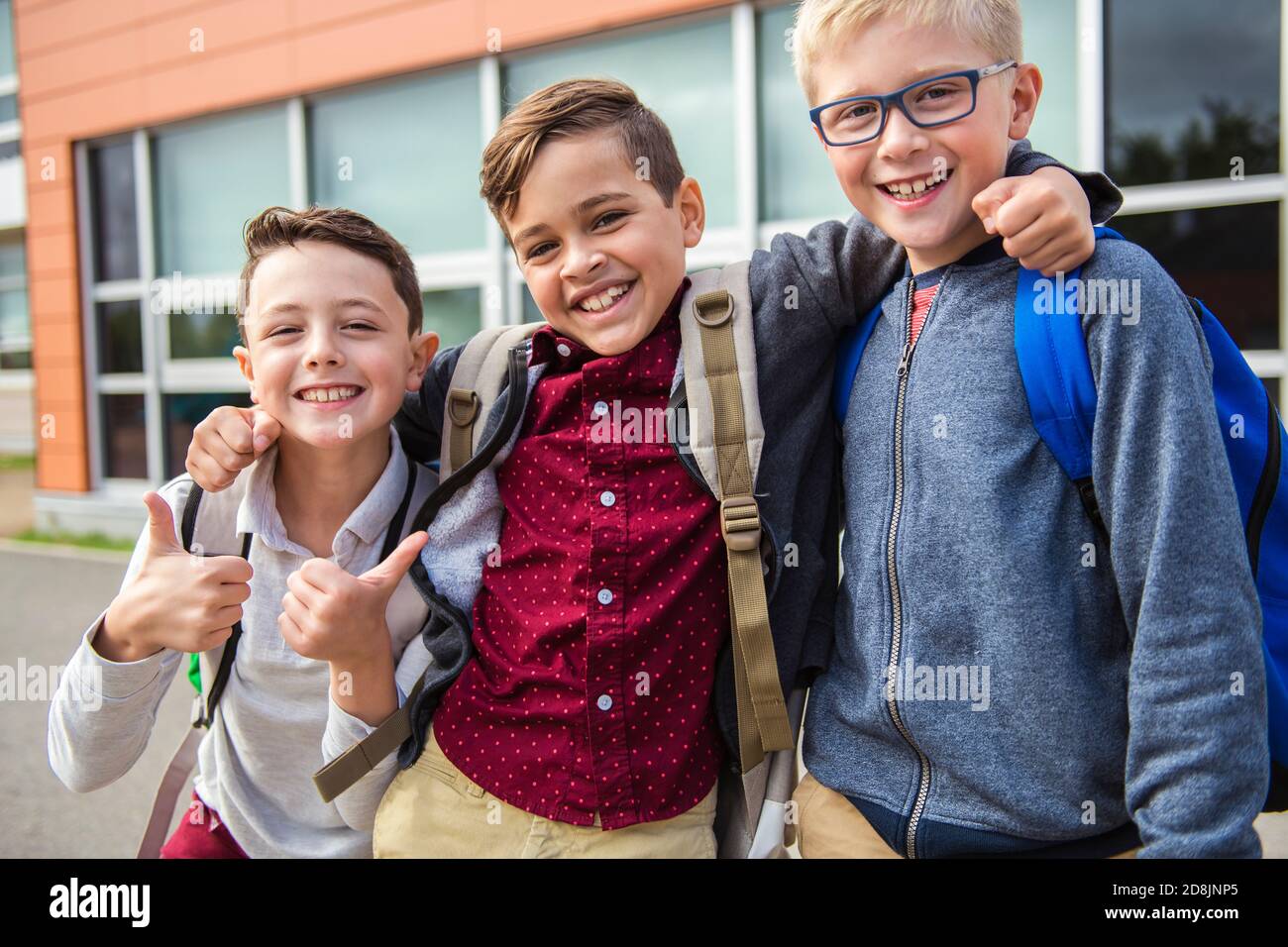 group of kids on the school background having fun Stock Photo - Alamy