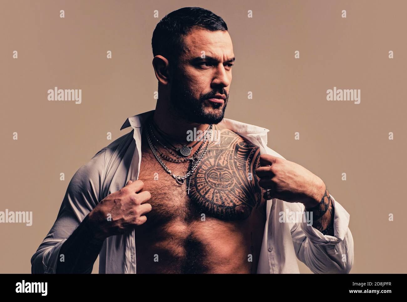 Charming and confident. Handsome latino man. Muscular man. Hispanic man ...