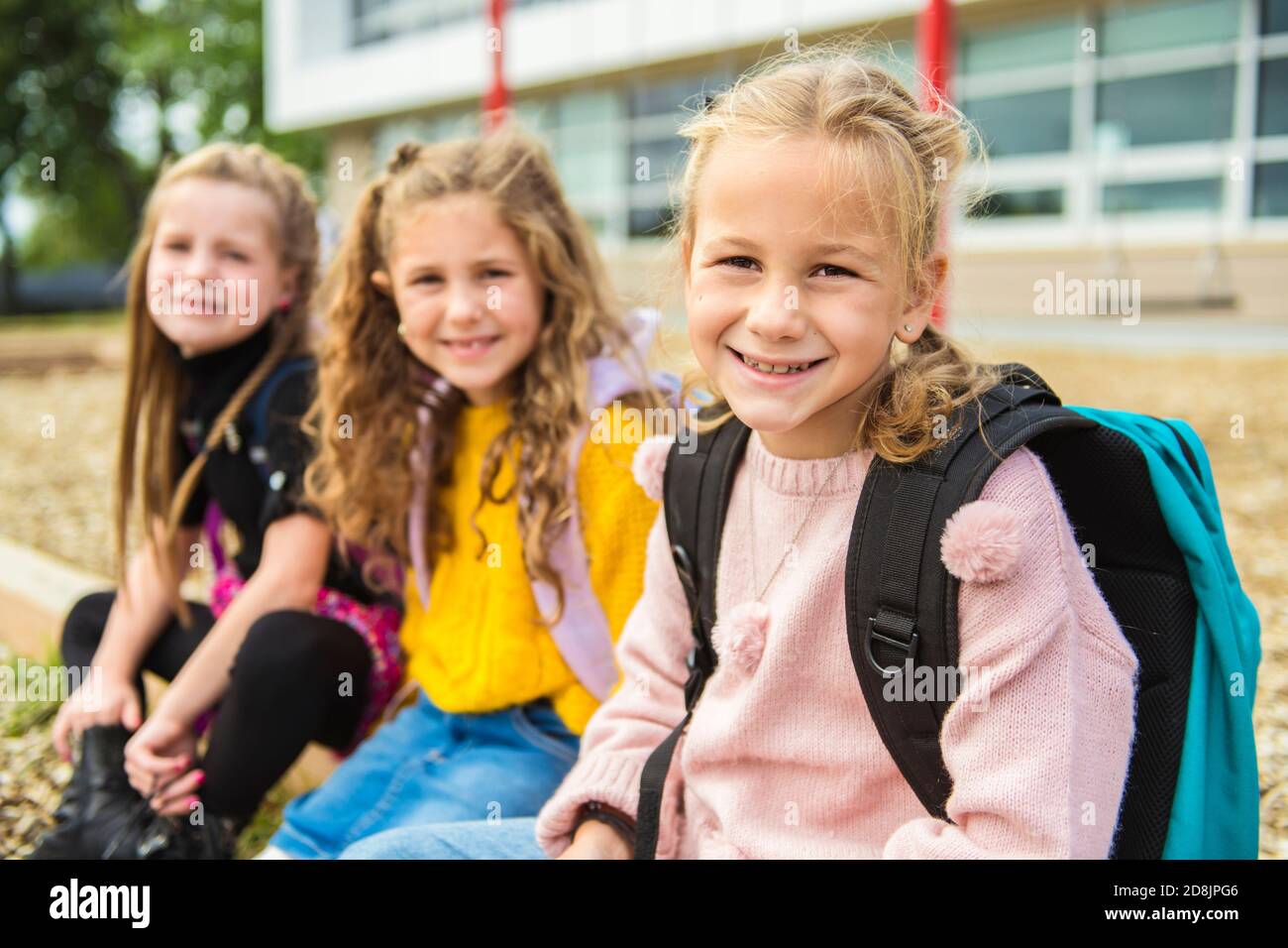 group of kids on the school background having fun Stock Photo - Alamy