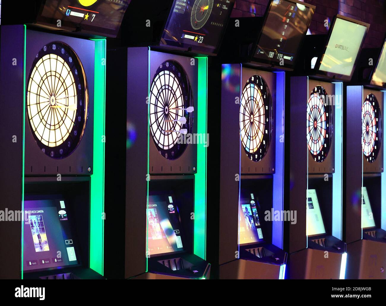 Tokyo, Japan. 30th Oct, 2020. Models play darts at a dinning bar of the ...