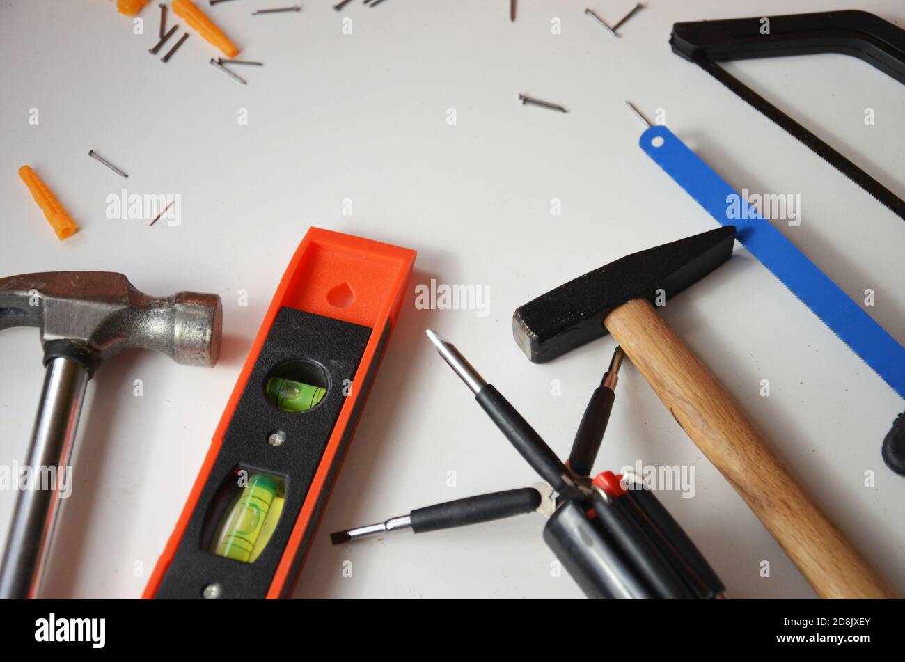 professional builder work with house renovation instruments on white ...